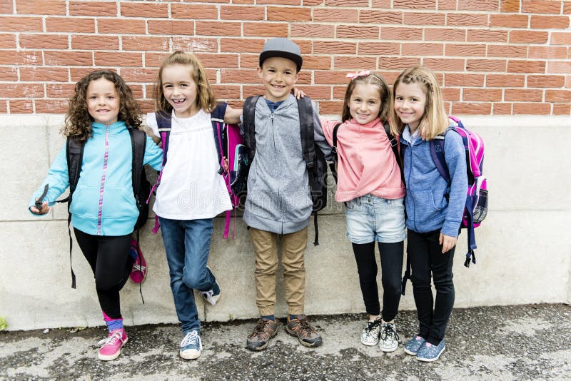 A Group of Students Outside at School Standing Together Stock Photo ...