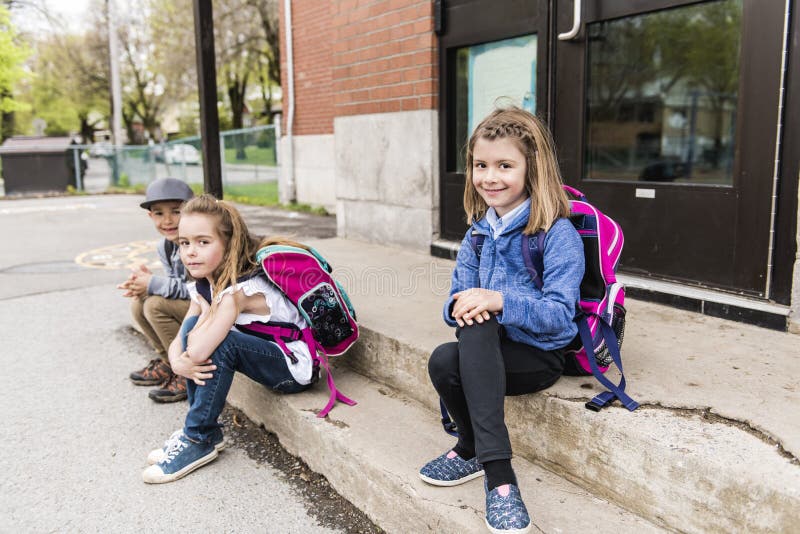 A Group of Students Outside at School Standing Together Stock Image ...