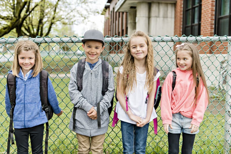A Group of Students Outside at School Standing Together Stock Photo ...