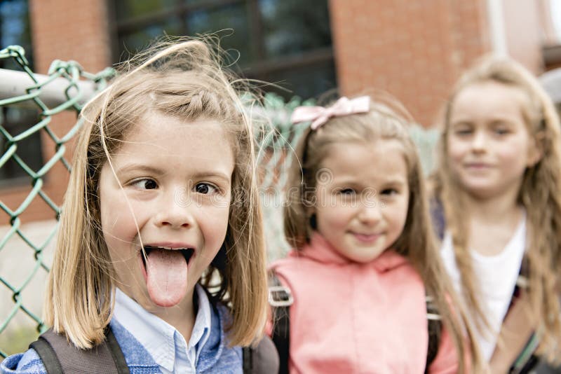 A Group of Students Outside at School Standing Together Stock Photo ...