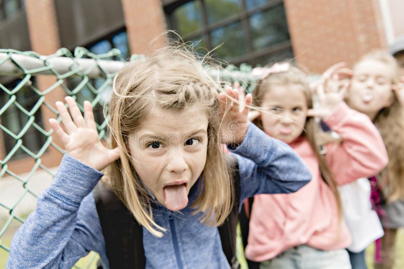 A Group of Students Outside at School Standing Together Stock Photo ...