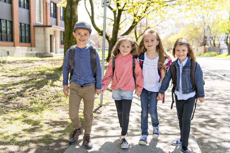 A Group of Students Outside at School Standing Together Stock Image ...