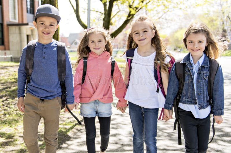 A Group of Students Outside at School Standing Together Stock Image ...