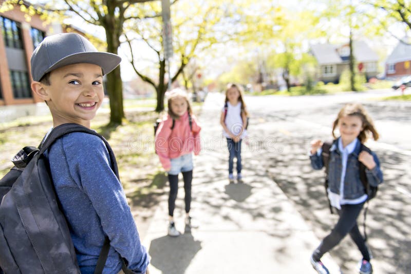 A Group of Students Outside at School Standing Together Stock Image ...