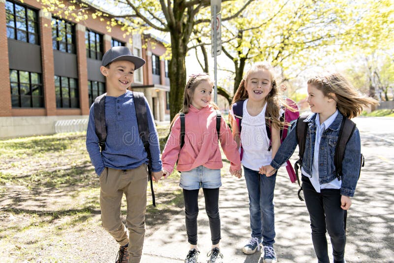 A Group of Students Outside at School Standing Together Stock Image ...