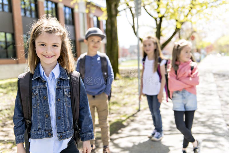 A Group of Students Outside at School Standing Together Stock Image ...