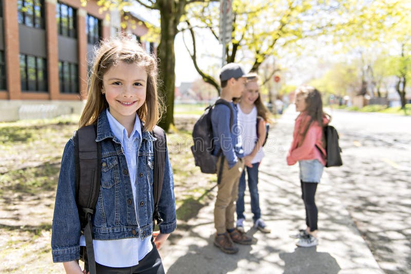 A Group of Students Outside at School Standing Together Stock Image ...