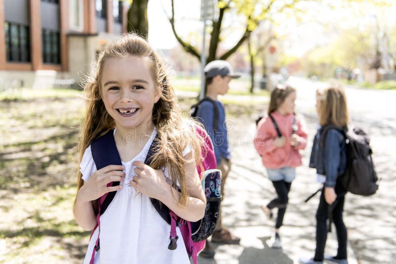 A Group of Students Outside at School Standing Together Stock Image ...