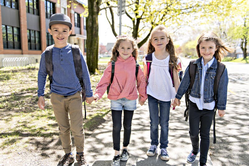 A Group of Students Outside at School Standing Together Stock Image ...