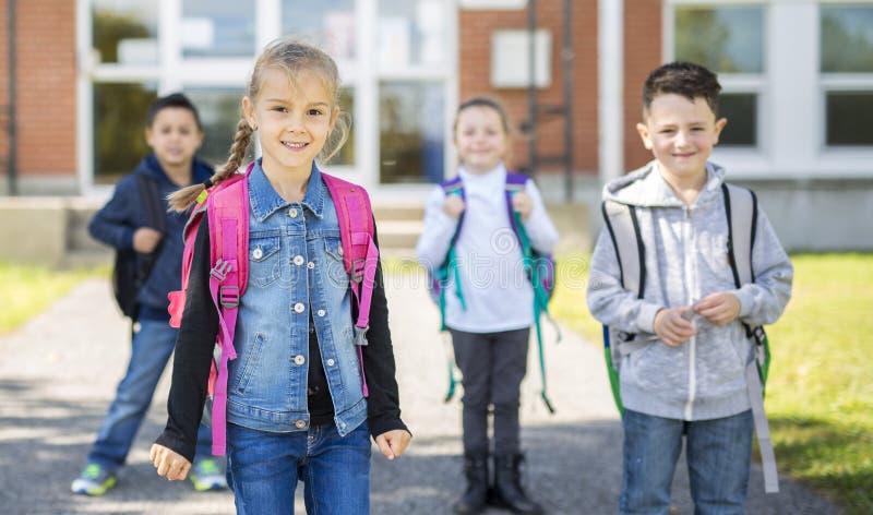 Students Outside School Standing Together Stock Photo - Image of school ...