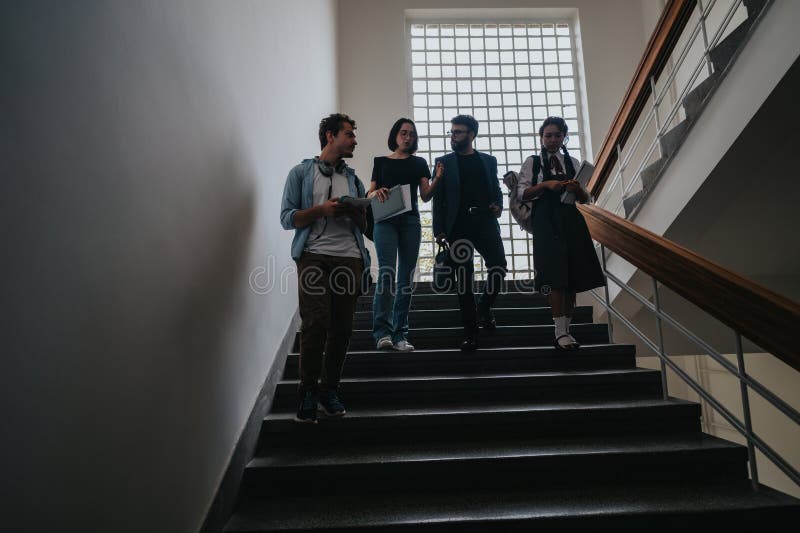 Group of Students and Professor Walking Down a Staircase Stock Photo ...