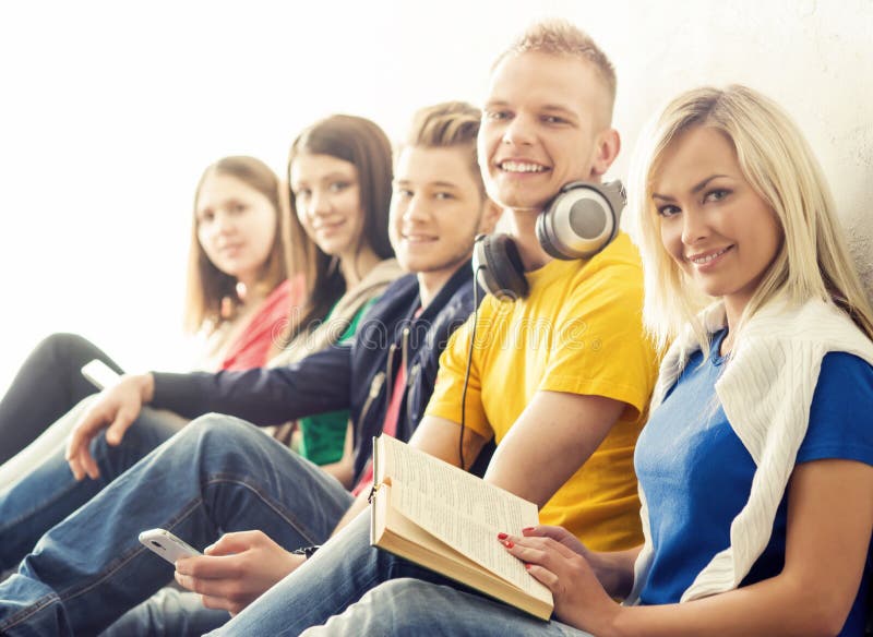 Group of Students Relaxing on a Break Stock Photo - Image of group ...