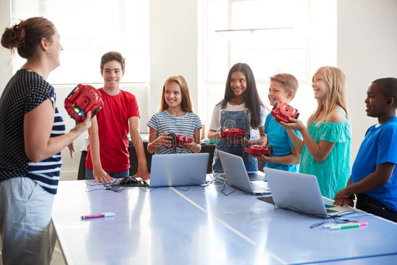 Group of Students in after School Computer Coding Class Learning To ...