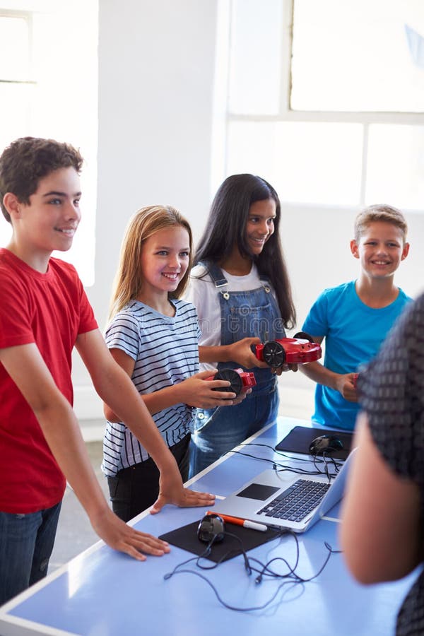 Group of Students in after School Computer Coding Class Learning To ...