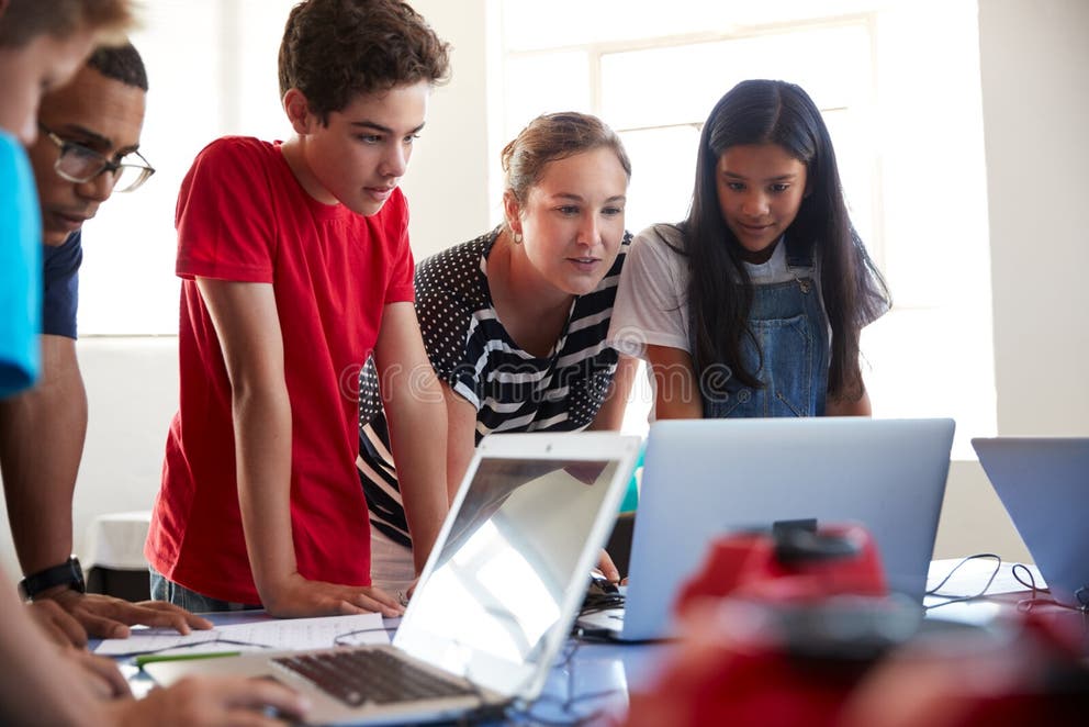 Group of Students in after School Computer Coding Class Learning To Program Robot Vehicle Stock ...