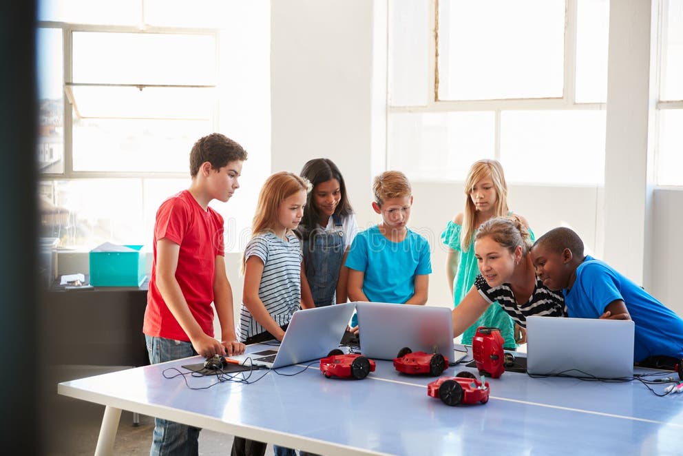 Group of Students in after School Computer Coding Class Learning To Program Robot Vehicle Stock ...