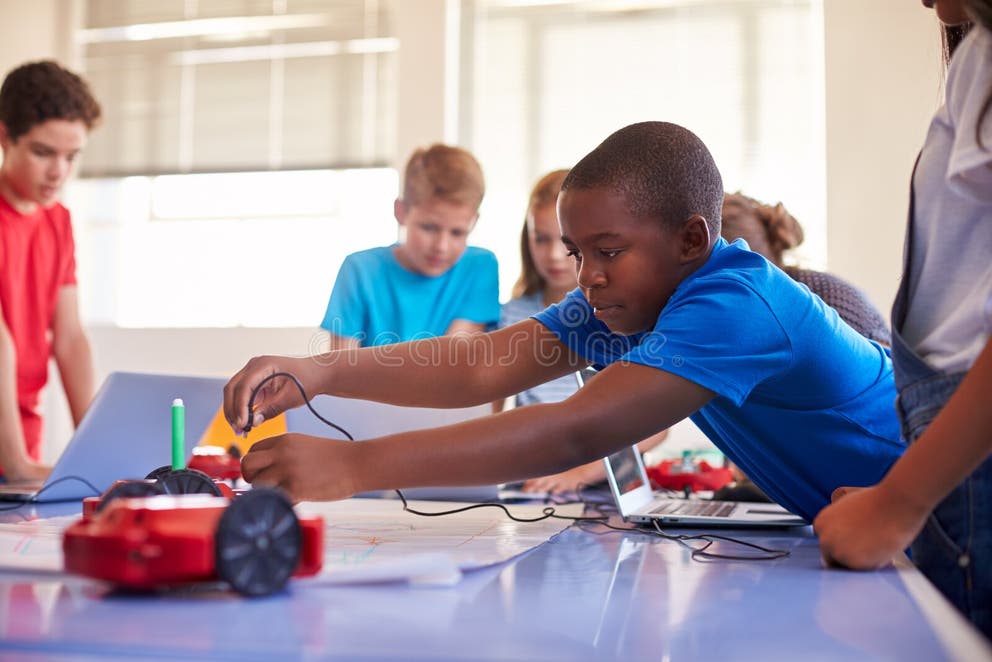 Group of Students in after School Computer Coding Class Learning To ...