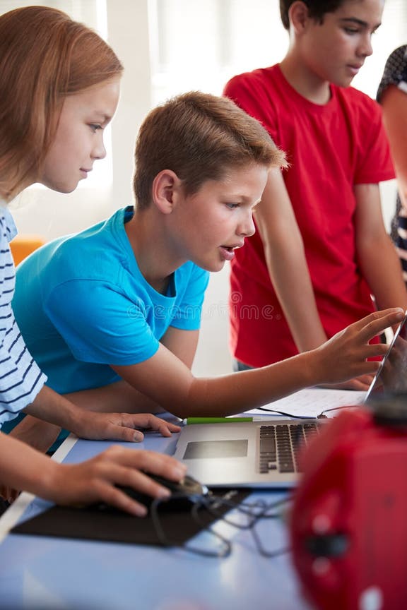 Group of Students in after School Computer Coding Class Learning To ...