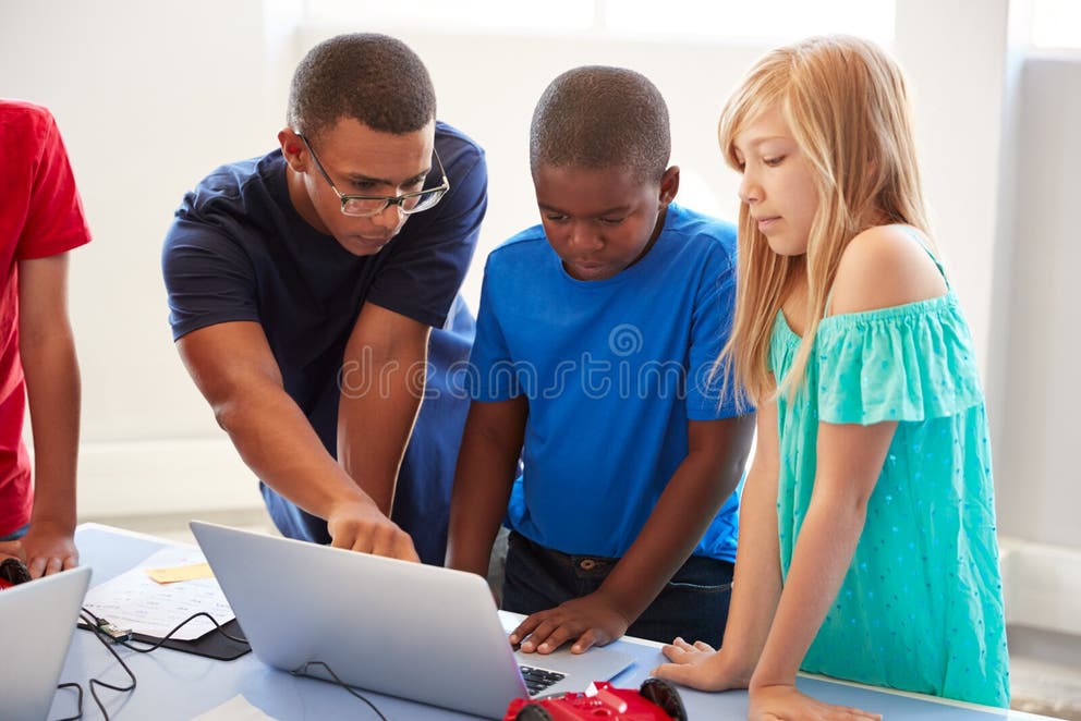 Group of Students in after School Computer Coding Class Learning To Program Robot Vehicle Stock ...