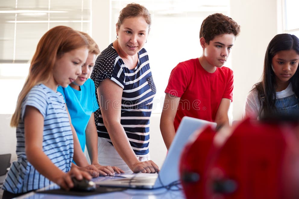 Group of Students in after School Computer Coding Class Learning To ...