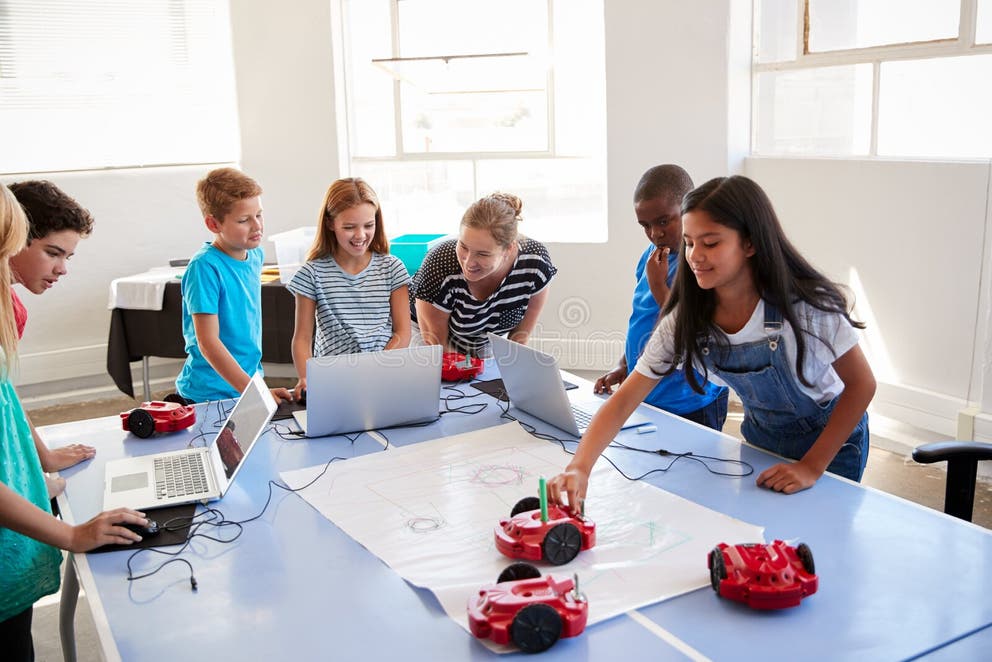 Group of Students in after School Computer Coding Class Learning To Program Robot Vehicle Stock ...
