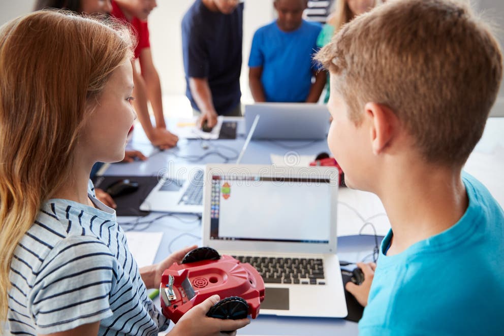 Group of Students in after School Computer Coding Class Learning To Program Robot Vehicle Stock ...