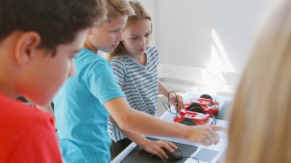 Group of Students in School Computer Coding Class Learning To Program Robot Vehicle Stock Image ...