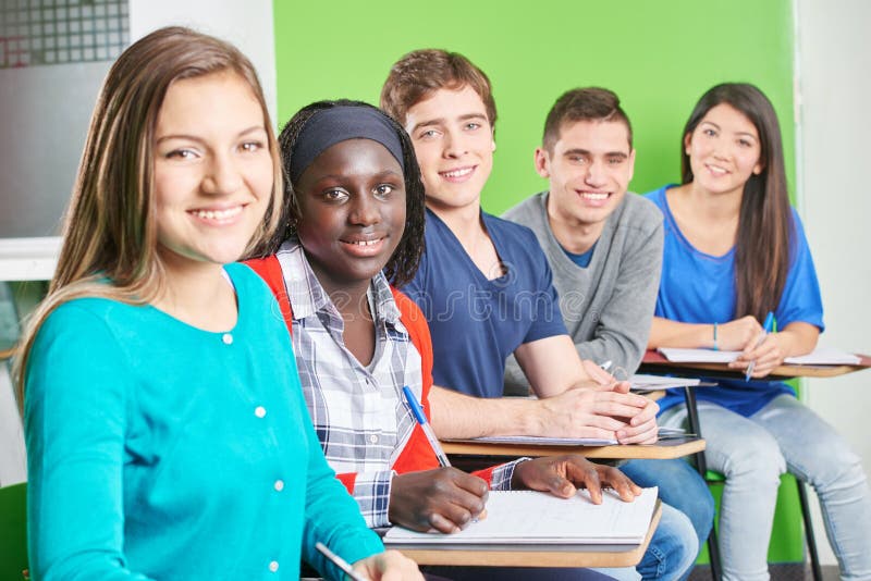 Students smiling in class stock image. Image of seminar - 21304575