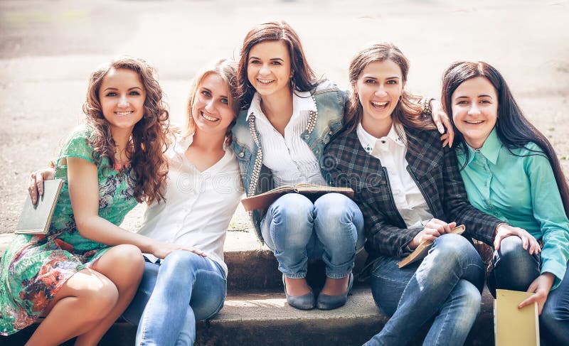 Group of Students Sitting with a Books Stock Image - Image of jeans ...