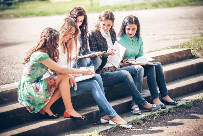 Group of Students Sitting with a Books Stock Photo - Image of books ...