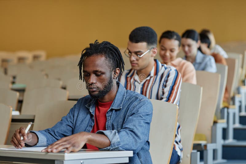 Students Sitting at Desk at Lecture Stock Image - Image of teen, study ...