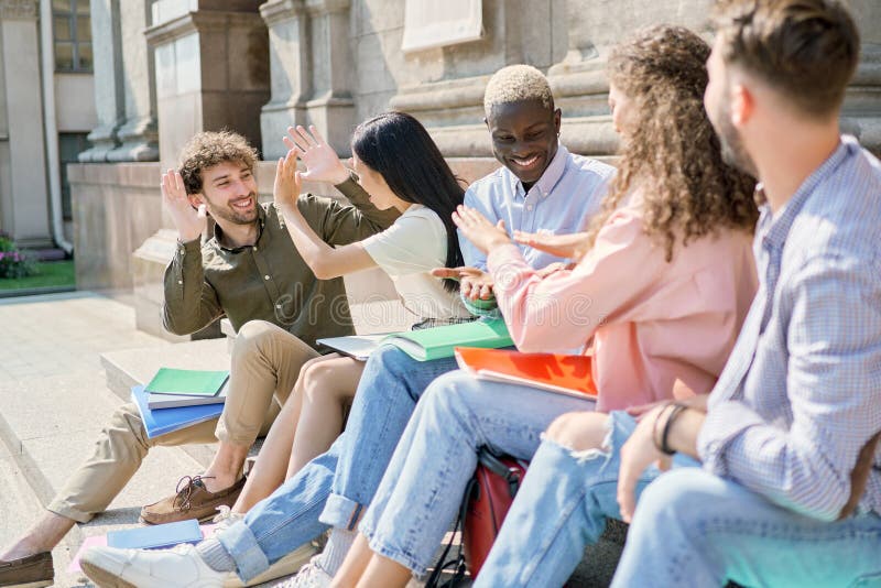 Group of Students Sitting on the Steps. Stock Image - Image of person ...