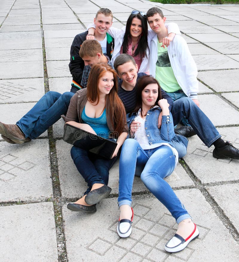 Group Students Sitting on Street Stock Image - Image of backpack ...