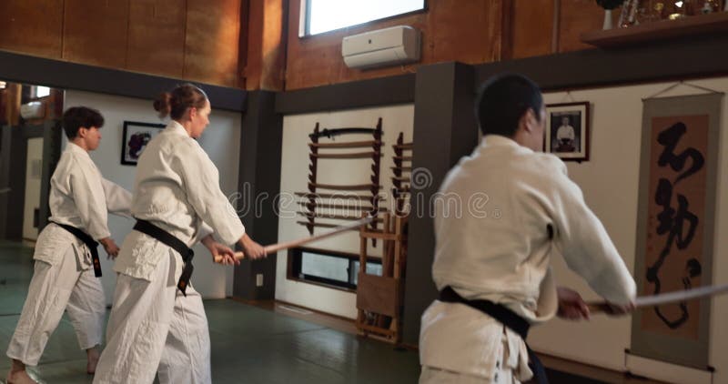 Group of Students, Stick or Learning Martial Arts in Dojo for Practice ...