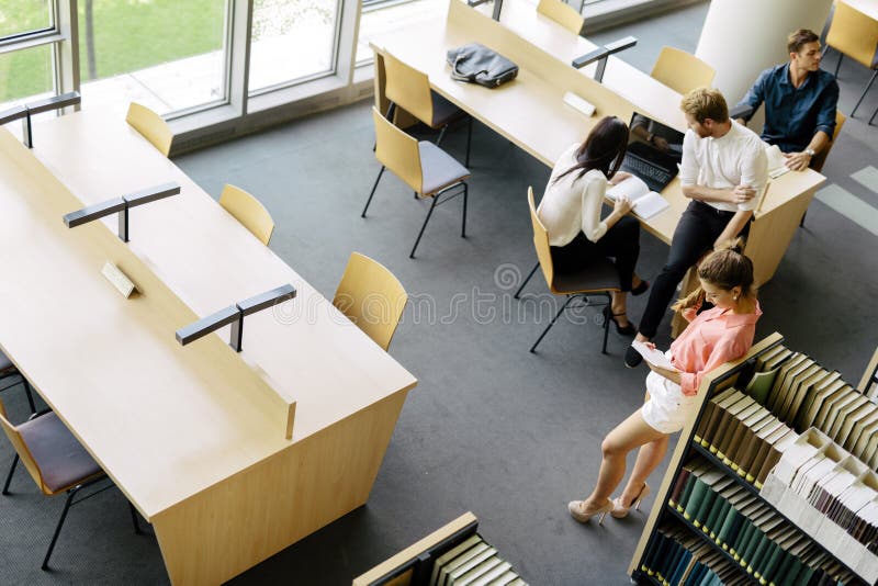 Group of Students Studying in a Library Stock Image - Image of female ...