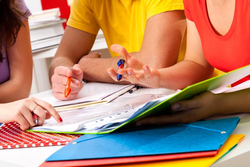 Group of Students Studying from Notes Stock Photo - Image of notes ...