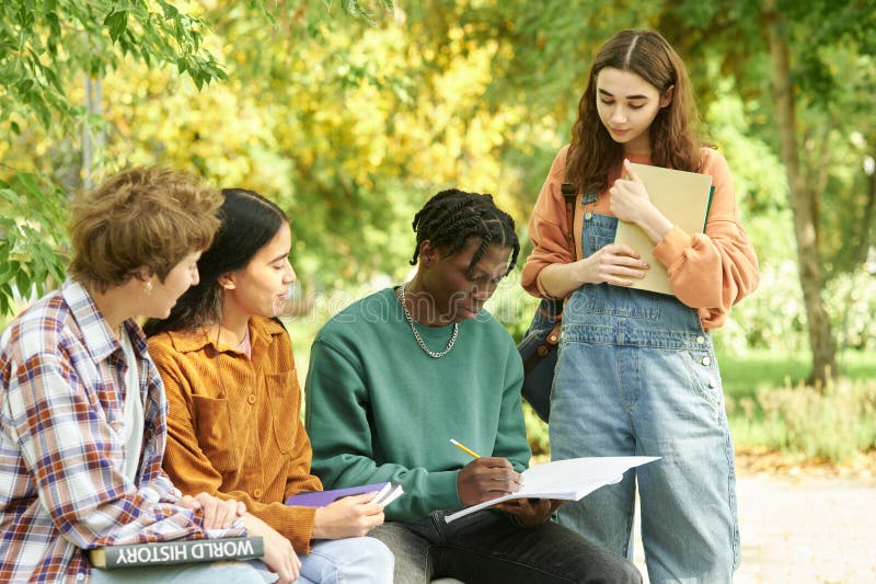 Group of Students Studying Outdoors and Collaborating Stock Image ...