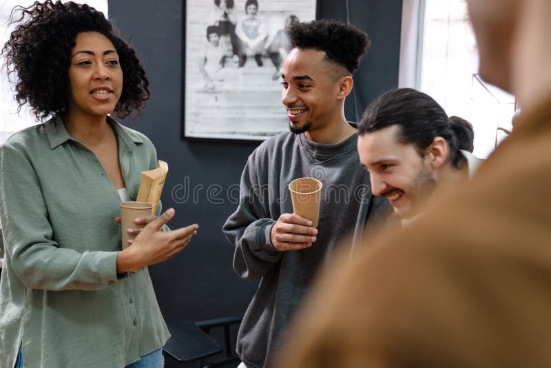 Group of Students Talking while Having a Coffee Break Stock Photo ...