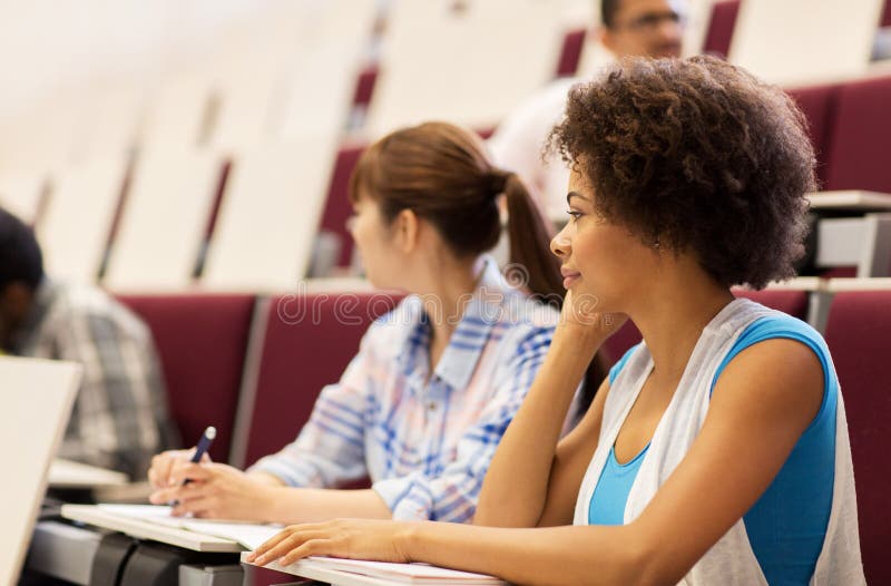 Group of Students Talking in Lecture Hall Stock Photo - Image of ...