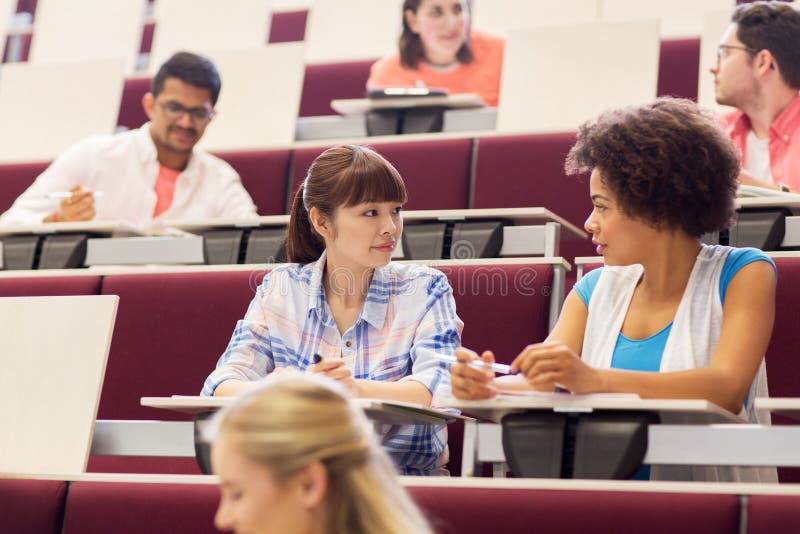 Group of Students Talking in Lecture Hall Stock Image - Image of ...