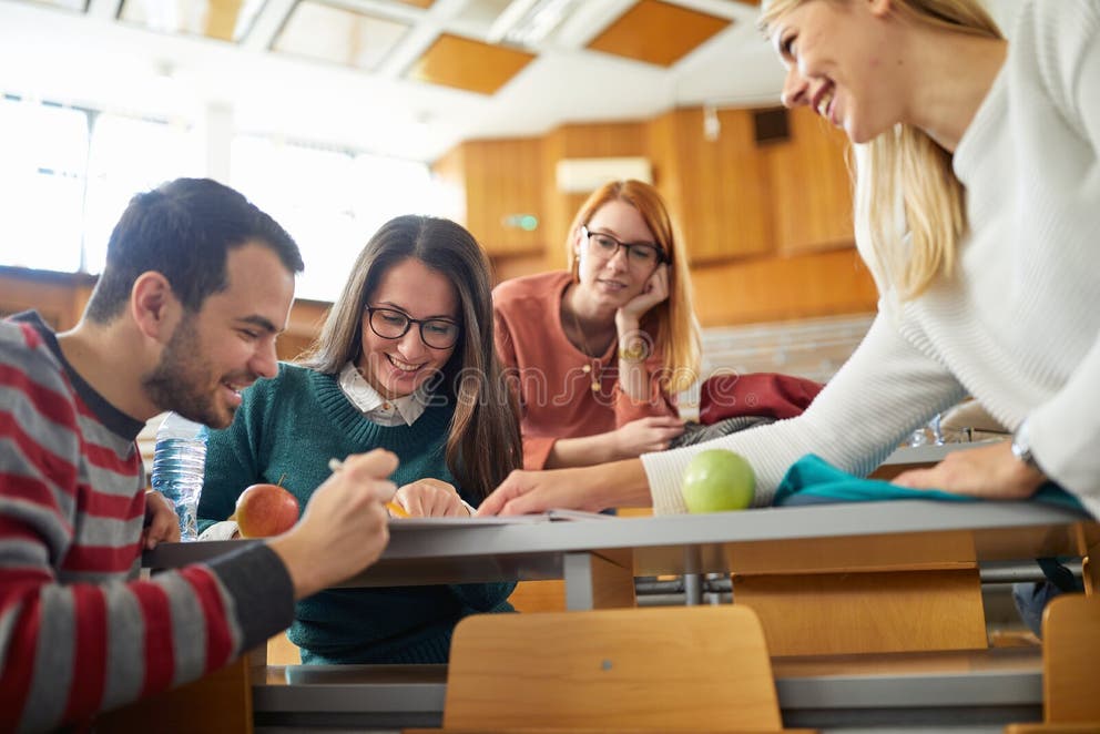 Group of Students Talking about the Lesson on the Lecture Break Stock ...