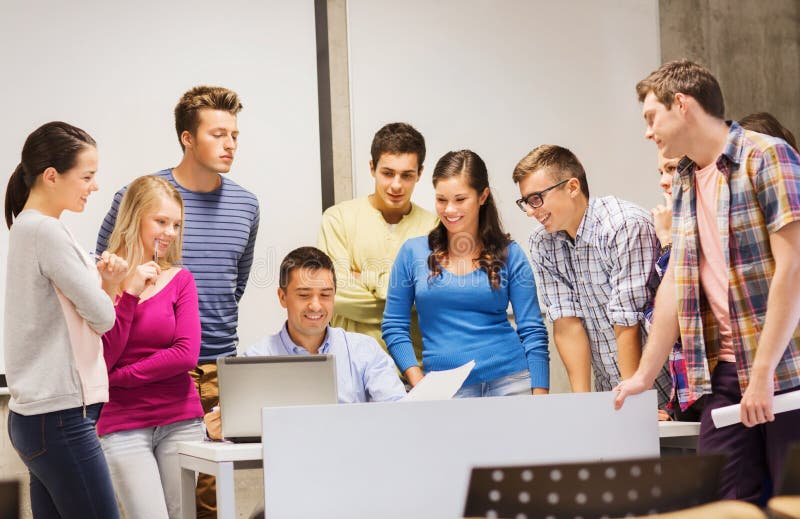 Group of Students and Teacher with Laptop Stock Image - Image of boys ...