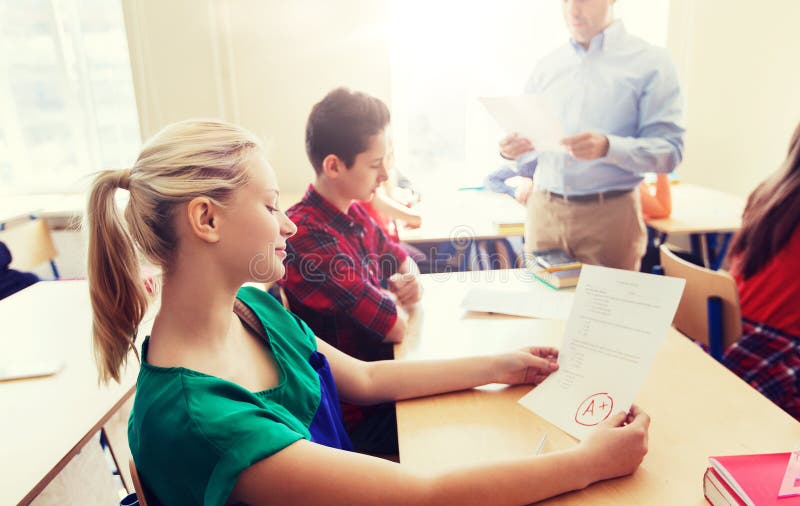 Group of Students and Teacher with Test Results Stock Image - Image of ...
