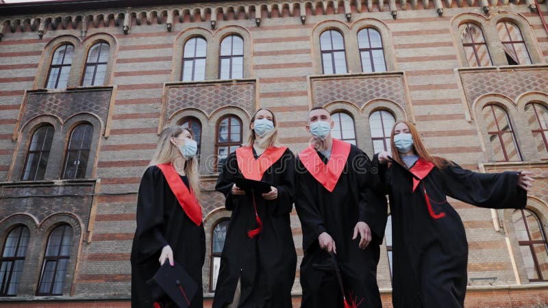 Group Students Tossed Dancing Hugging while Celebrating Graduation Day ...