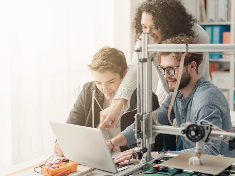 Group of Students Using a 3D Printer and a Laptop Stock Image - Image ...