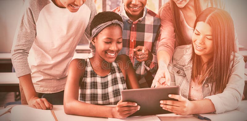 Group of Students Using Digital Tablet in Classroom Stock Photo - Image ...