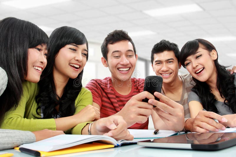 Group of Students Using Mobile Phone Stock Photo - Image of success ...