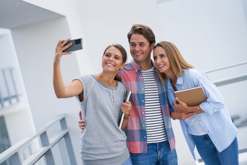 Group of Students Using Smartphone in the Campus Stock Photo - Image of ...