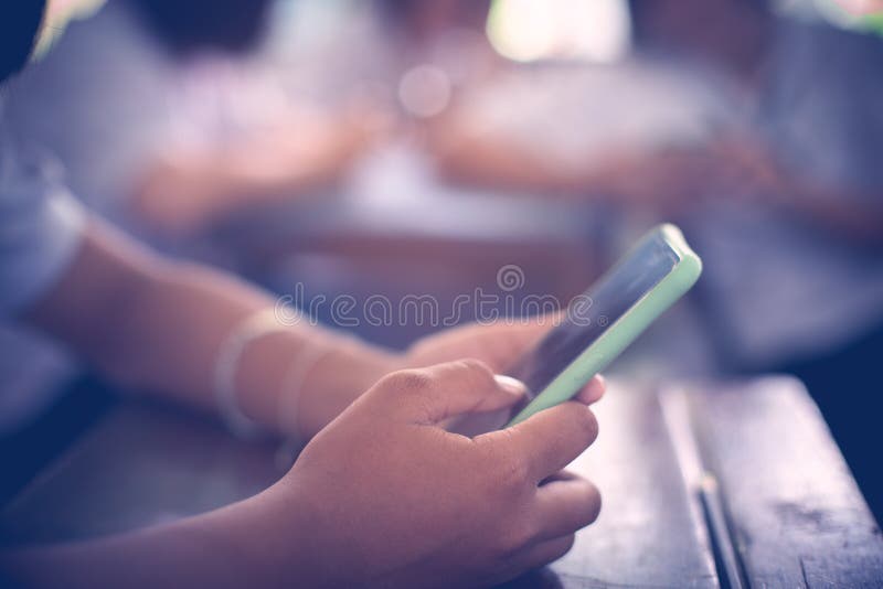 Group of Students Using Smartphones during the Lecture in the Classroom ...