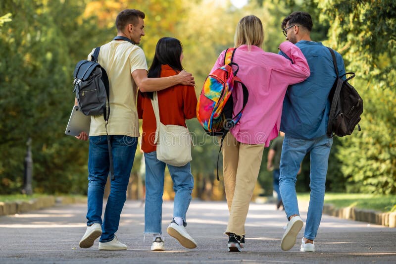 Group of Students Walking in the Park and Looking Excited Stock Photo ...